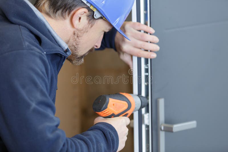 Construction Worker Using Drill Stock Photo - Image of carpenter ...