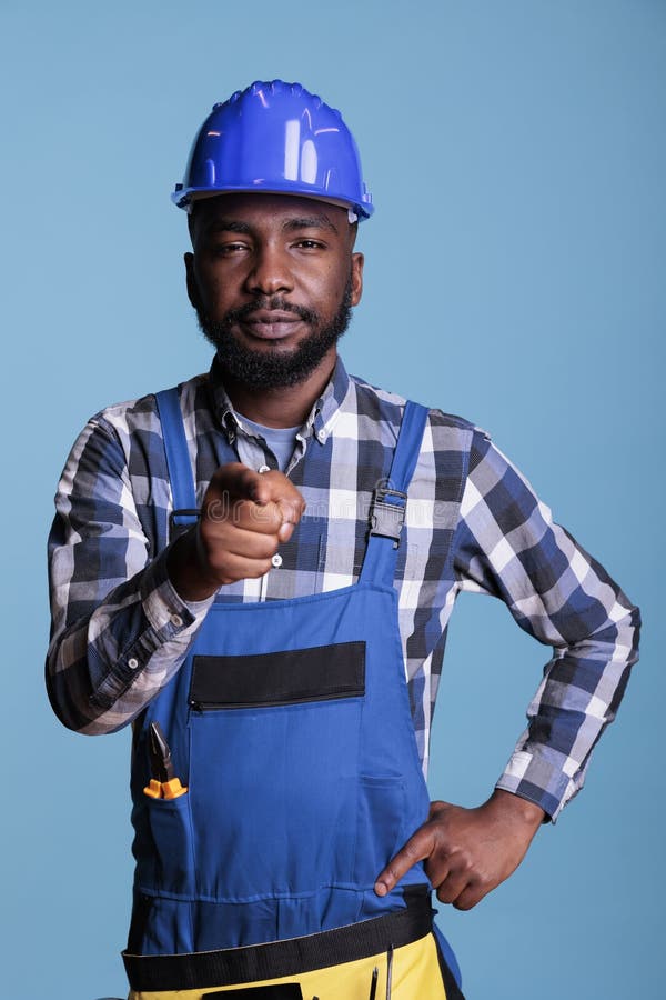 Construction Worker Using Index Finger To Point Stock Photo - Image of ...
