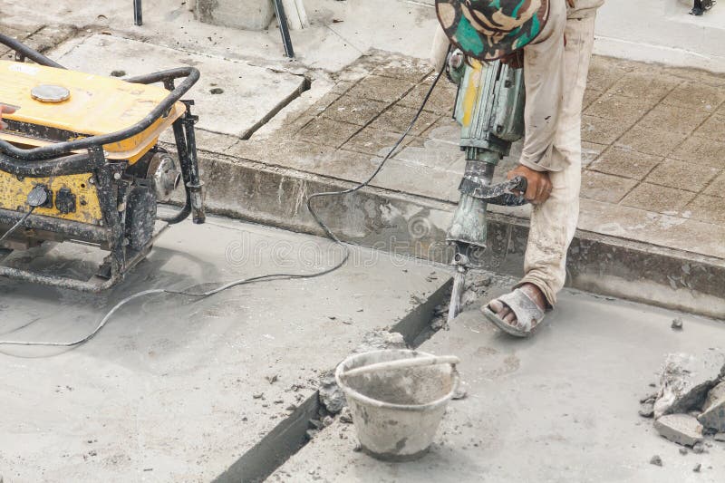Construction Worker Using Jackhammer Drilling Concrete Surface Stock ...