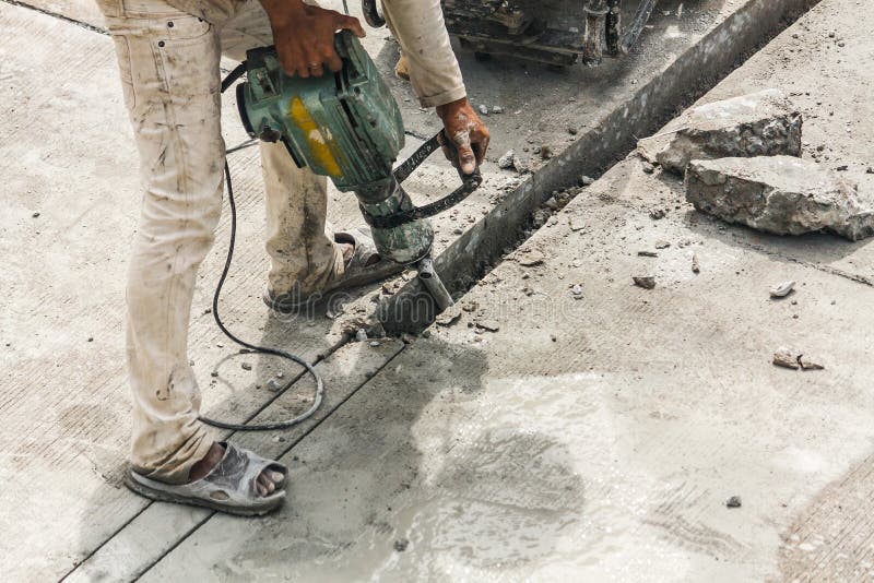 Construction Worker Using Jackhammer Drilling Concrete Surface Stock ...