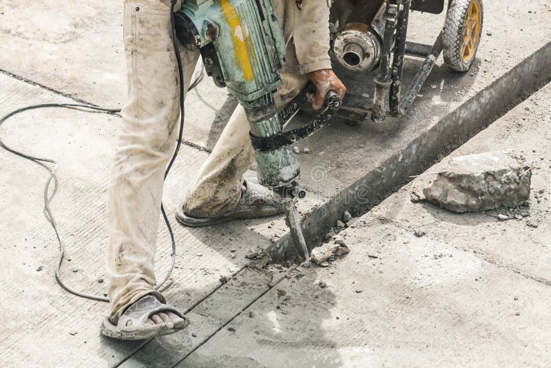 Construction Worker Using Jackhammer Drilling Concrete Surface Stock ...