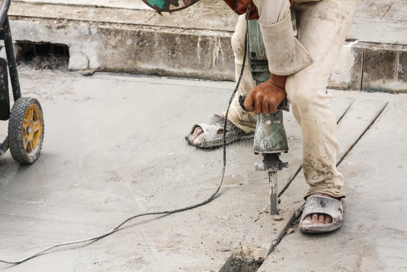 Construction Worker Using Jackhammer Drilling Concrete Surface Stock ...