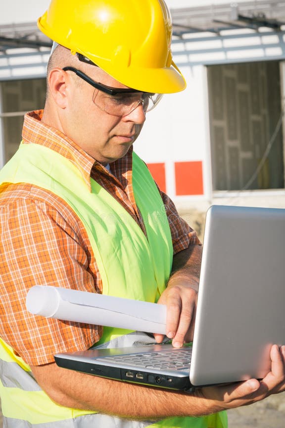 Construction Worker Using Laptop Stock Image - Image of contractor ...