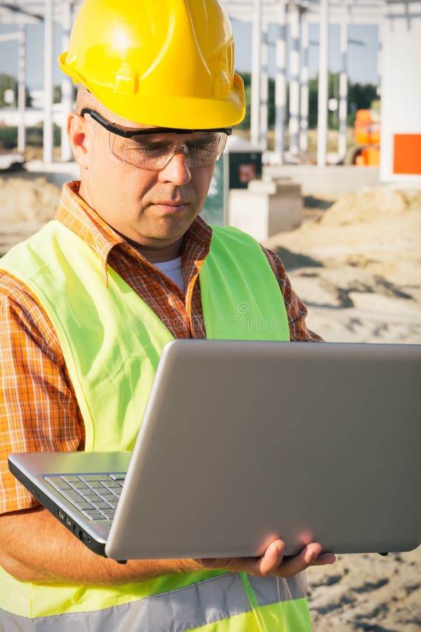 Construction Worker Using Laptop Stock Image - Image of foreman ...