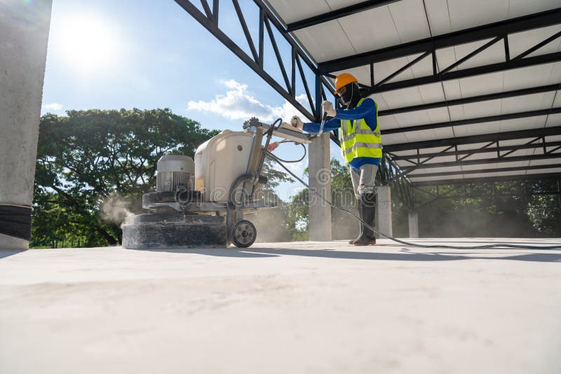 Construction Worker Using Machine Polishing Surface Floor Smoothing and ...