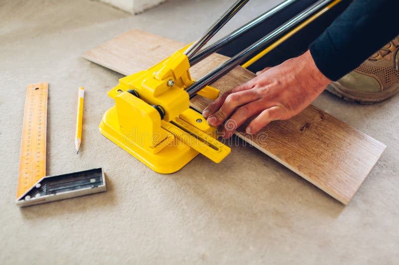 Construction Worker Using Manual Tile Cutter Equipment for Laying ...