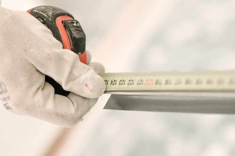 Construction Worker Using Measuring Tape Stock Image - Image of ...