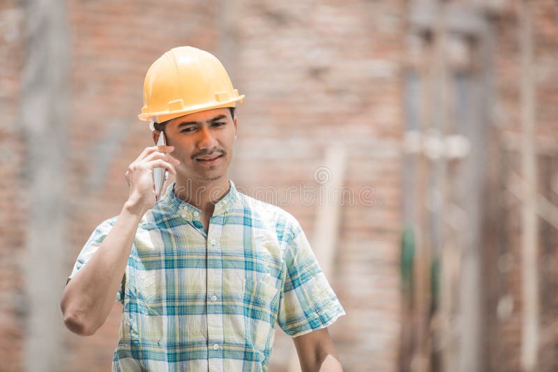 Construction Worker Using Mobile Phone Stock Image - Image of ...