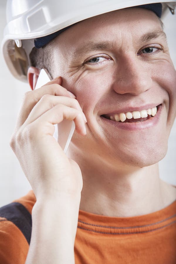 Construction Worker Using Mobile Phone Stock Photo - Image of carpenter ...