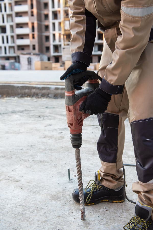 Construction Worker Using Power Drill on Site Stock Image - Image of ...
