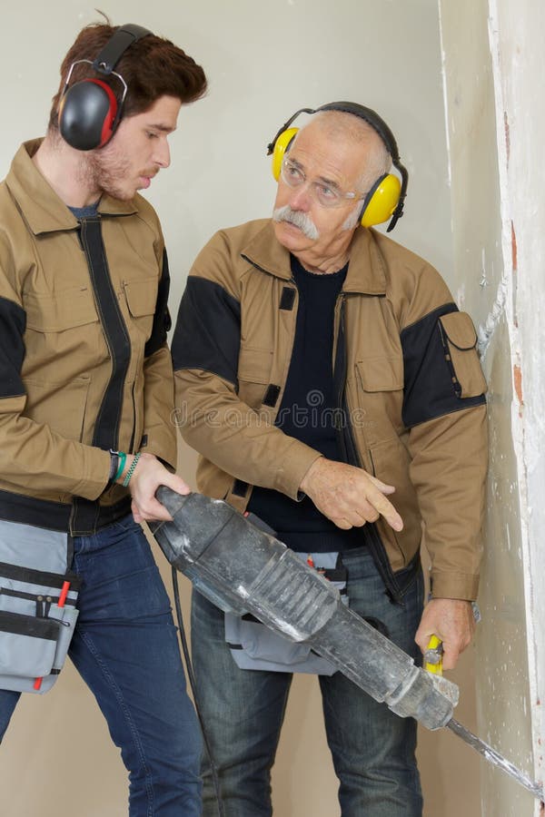 Construction Worker Using Professional Drill Press Stock Image - Image ...