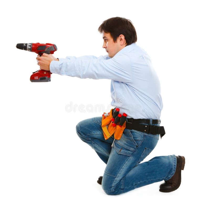 Construction Worker Using Screwdriver As Gun Stock Photo - Image of ...