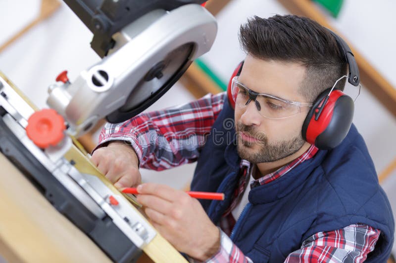 Construction Worker Using Slider Compound Mitre Saw Stock Image - Image ...