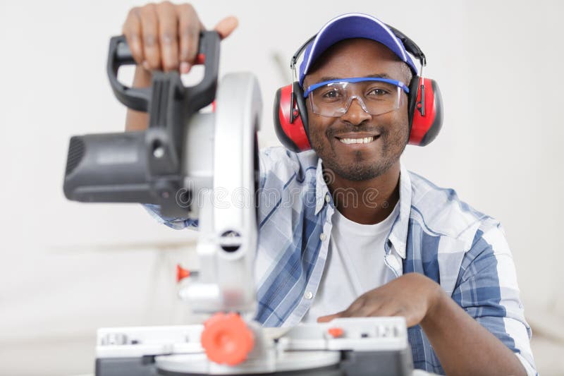 Construction Worker Using Slider Compound Mitre Saw Stock Image - Image ...