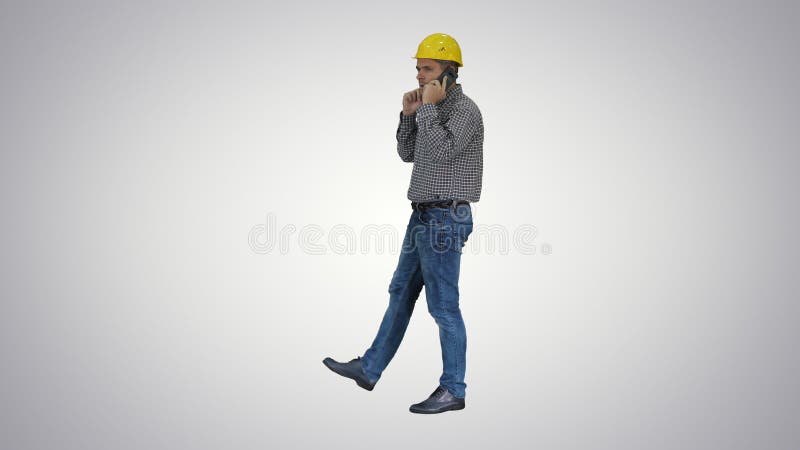 Construction Worker Using Smartphone on Gradient Background. Stock ...