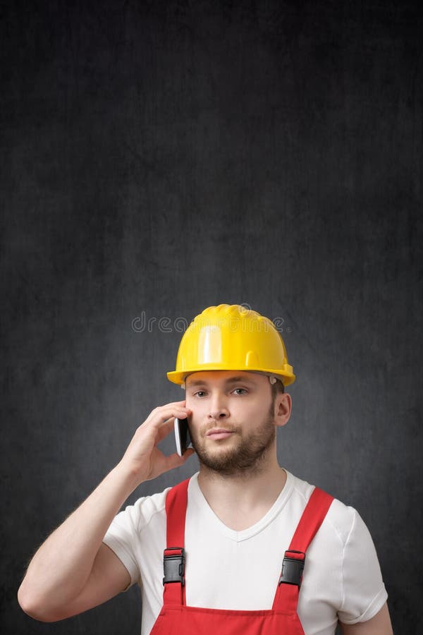 A Construction Worker Using Smartphone Stock Photo - Image of call ...