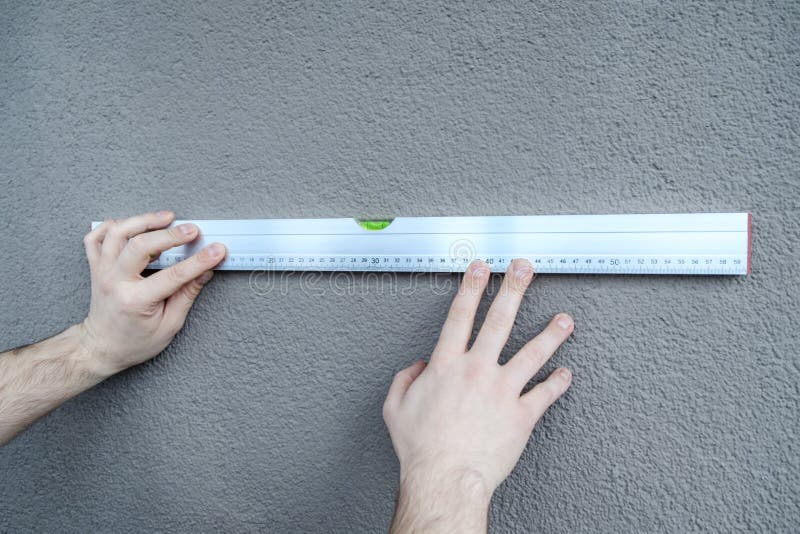 Construction Worker Using Spirit Level Stock Image - Image of liquid ...