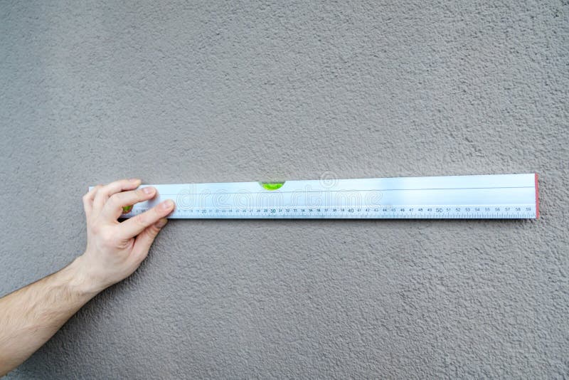 Construction Worker Using Spirit Level Stock Image - Image of repairman ...