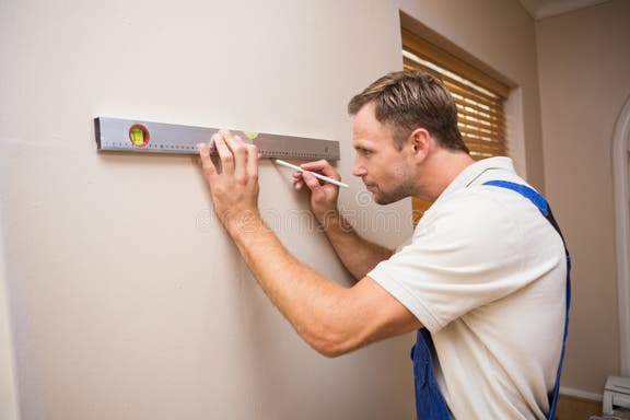 Construction Worker Using Spirit Level Stock Photo - Image of ...