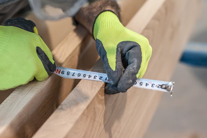 Construction Worker Using Tape Measure Stock Photo - Image of craftsman ...