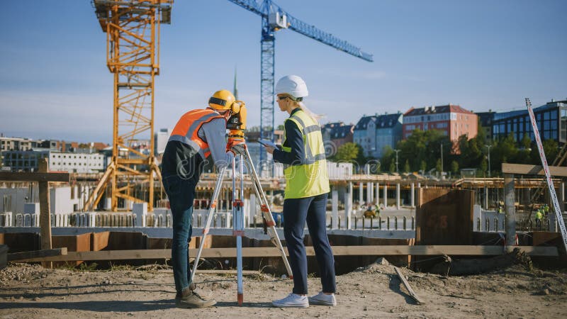Construction Worker Using Theodolite Surveying Optical Instrument for ...