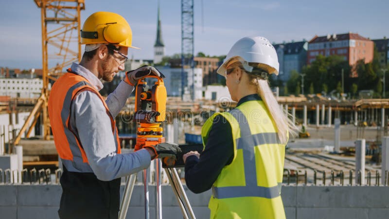 Construction Worker Using Theodolite Surveying Optical Instrument for ...