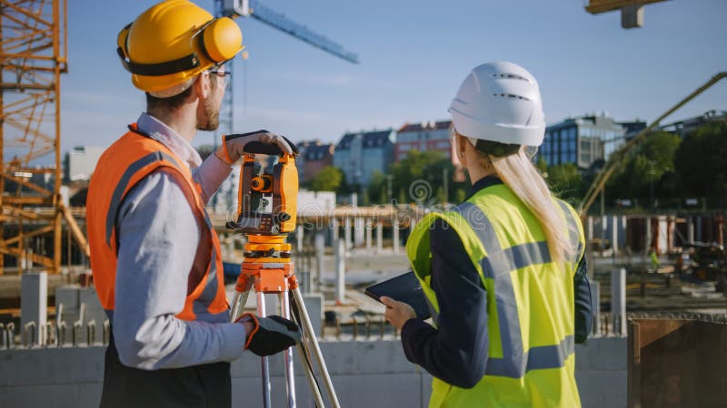 Construction Worker Using Theodolite Surveying Optical Instrument for ...