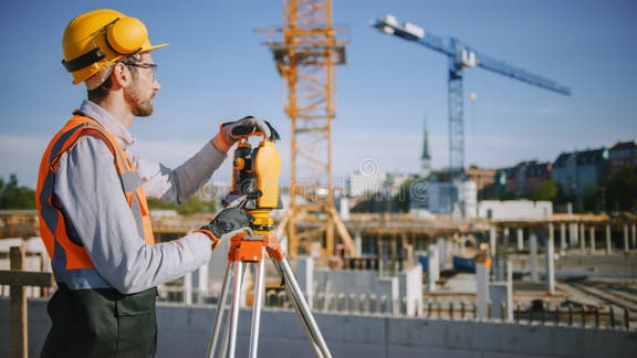 Construction Worker Using Theodolite Surveying Optical Instrument for ...