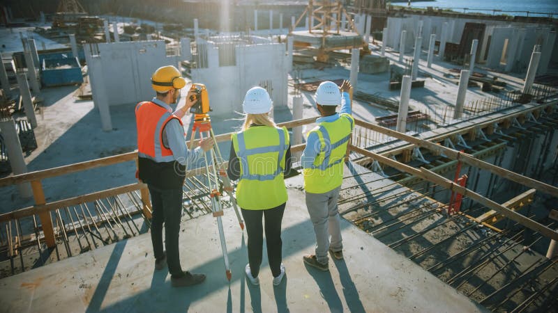 Construction Worker Using Theodolite Surveying Optical Instrument for ...