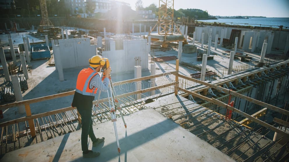 Construction Worker Using Theodolite Surveying Optical Instrument for ...