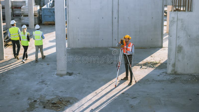 Construction Worker Using Theodolite Surveying Optical Instrument for ...