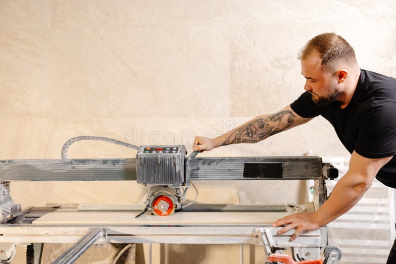 Construction Worker Using Tile Saw Cutting Ceramic Tiles Stock Image ...