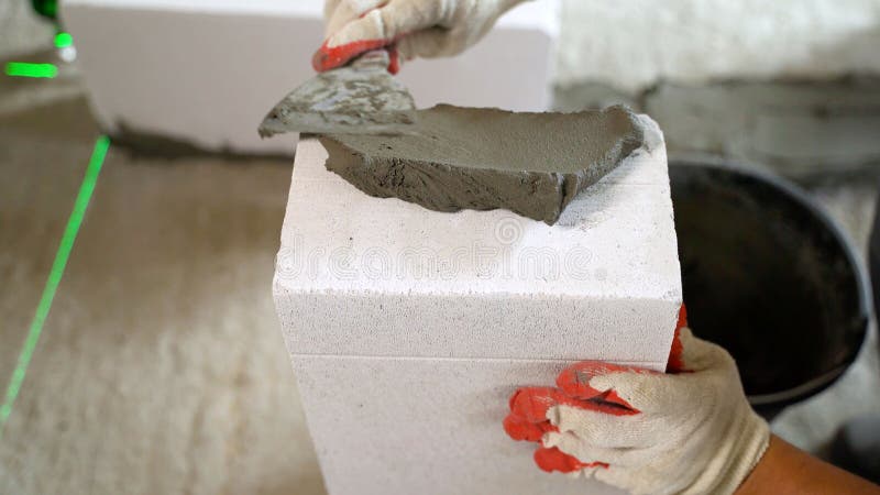 Construction Worker Applying Cement Aerated Concrete Block Stock Photos ...
