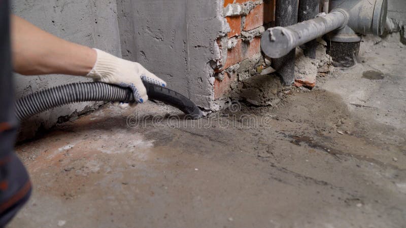 Construction Worker Removing Dust and Debris with Industrial Vacuum ...