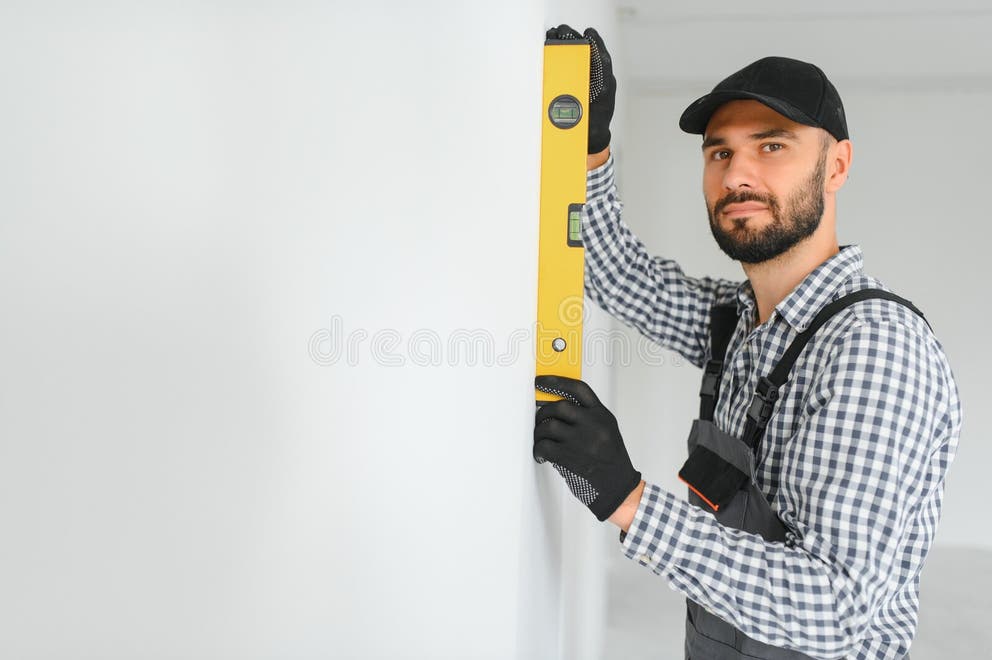 Construction Worker Using a Water Level. Stock Image - Image of manual ...