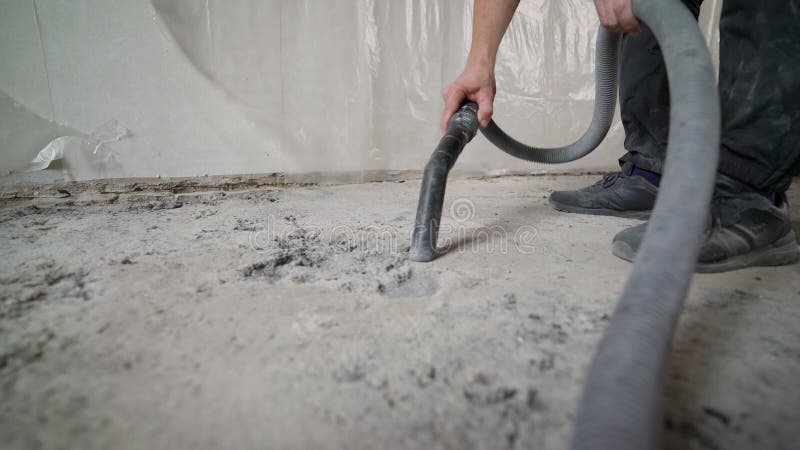 Construction Worker Vacuuming Dust on Concrete Floor. Stock Video ...