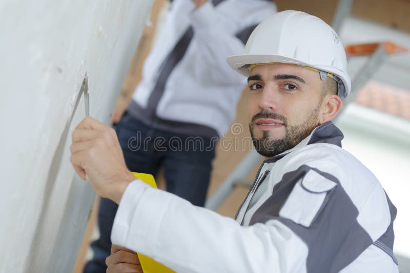 Construction Worker with Wall Plastering Tools Renovating Apartment ...