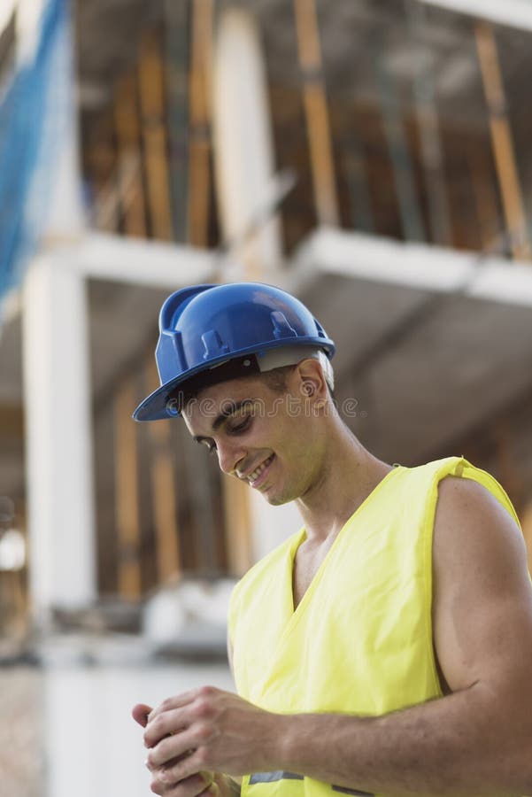 Construction Worker Warming and Looking His Hands Stock Image - Image ...