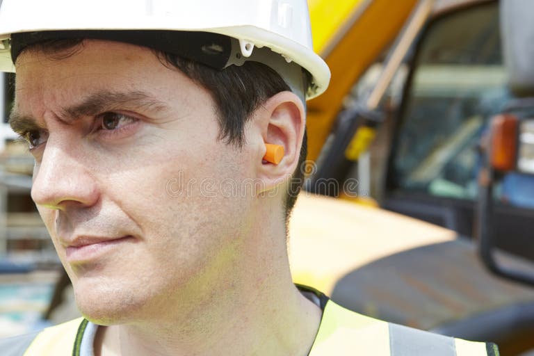 Construction Worker Wearing Protective Ear Plugs Stock Photo - Image of ...