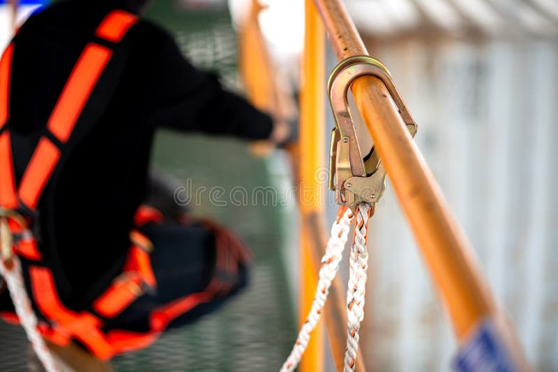 Construction Worker Wearing Safety Harness Working at High Place Stock ...