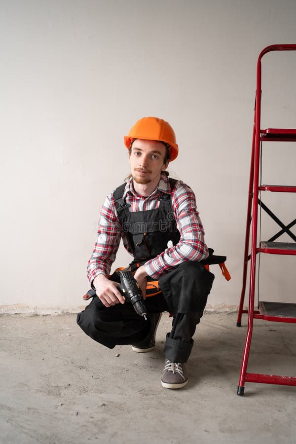 Construction Worker Wearing Safety Helmet, Thinking at Construction ...