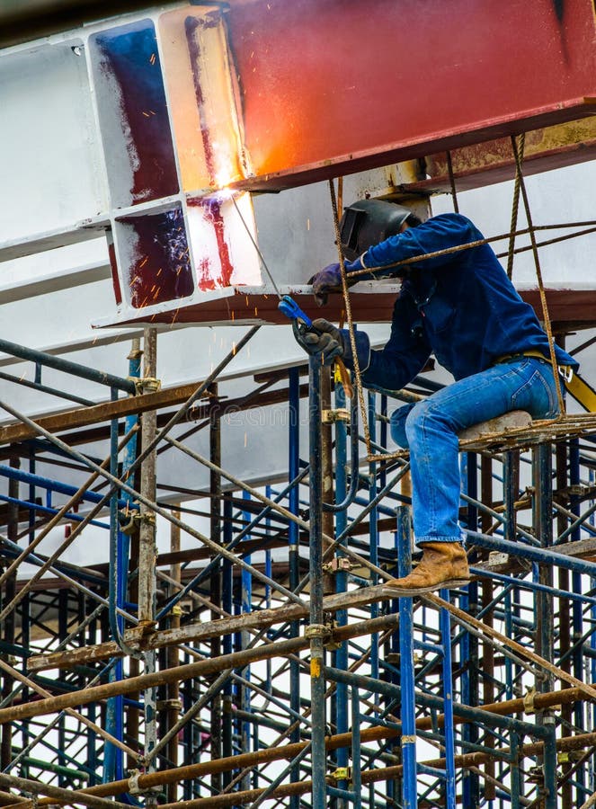 A Construction Worker Welding Steel Bars. Stock Image - Image of ...