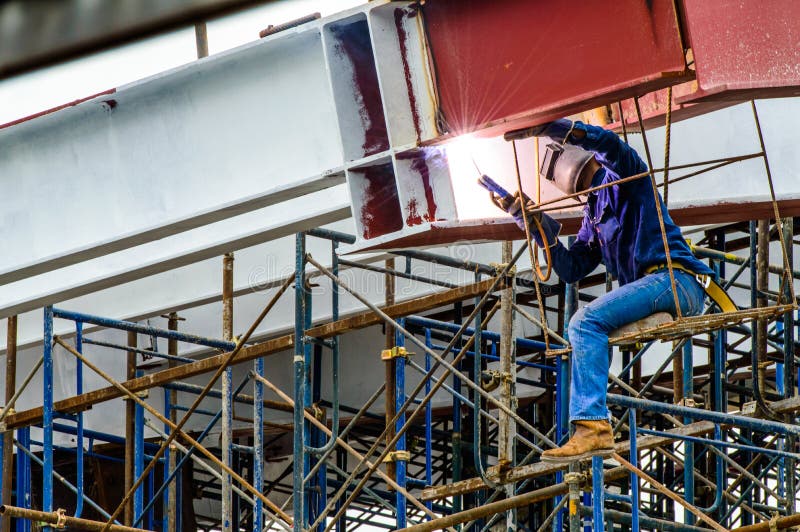 A Construction Worker Welding Steel Bars. Stock Image - Image of ...