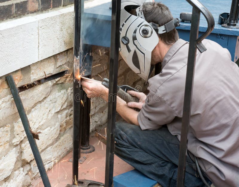 Worker Welding Post stock photo. Image of laboring, industrial - 110642304