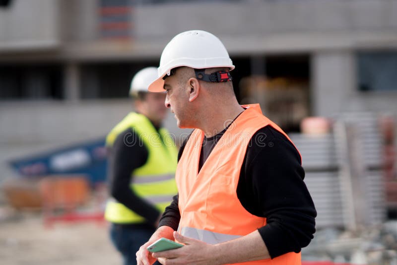 Construction Worker at Work on Construction Site Stock Image - Image of ...