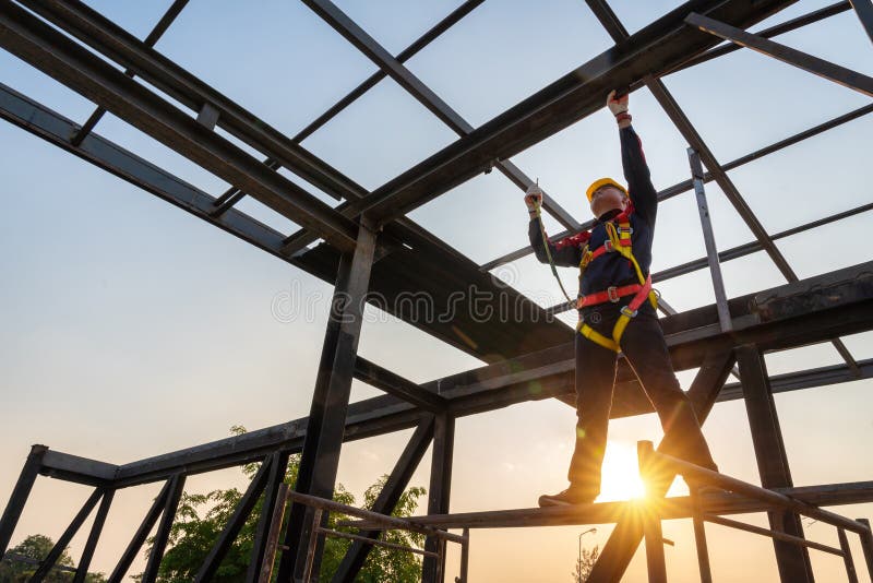 A Construction Worker Working at Height Equipment Using the Hook for ...