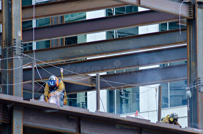 Construction Worker Working on Highrise Building Stock Image - Image of ...