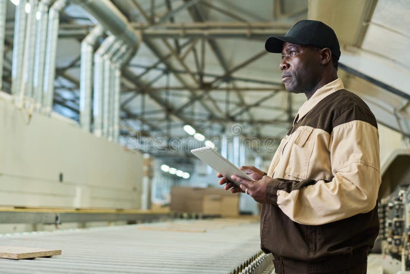 Construction Worker Working on Tablet Pc Stock Photo - Image of ...