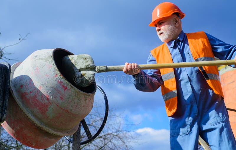 Construction Worker Works with Concrete Mixer. Cement Creation. Builder ...