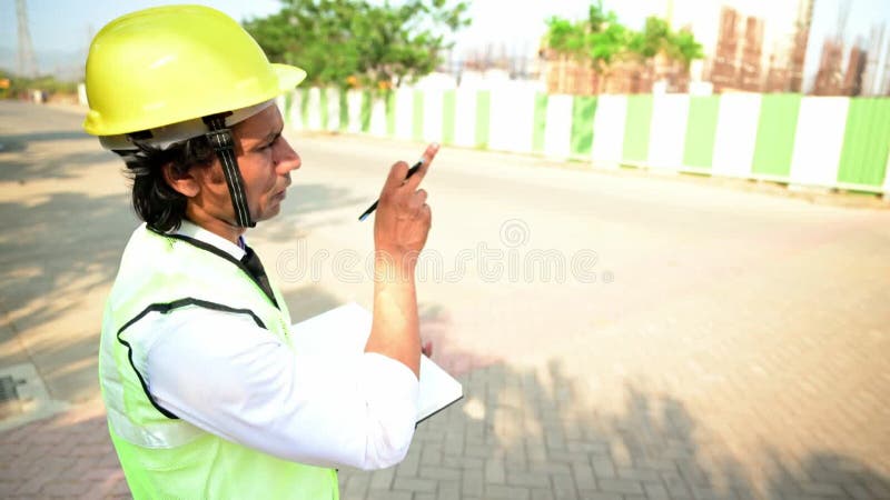 Construction Worker Writing on Clipboard Stock Footage - Video of ...